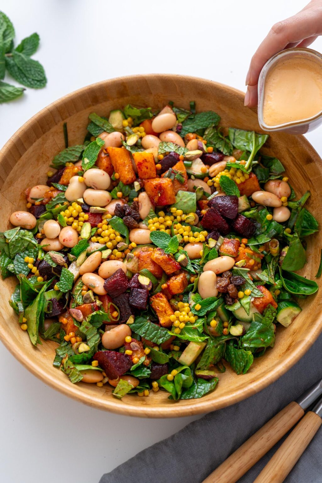 Moroccan Spiced Pearl Couscous Salad with Tahini Dressing | plantbaes